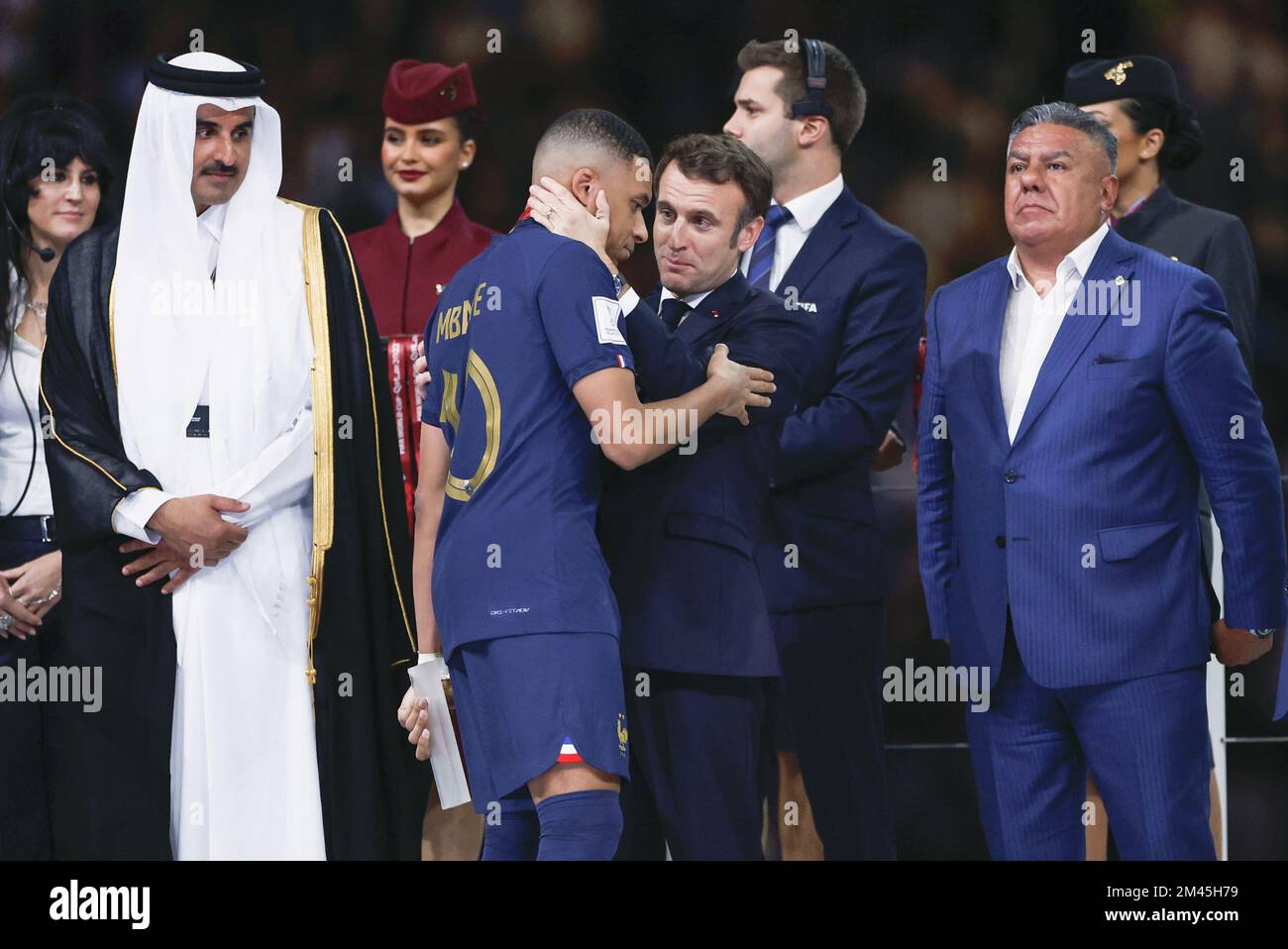 Lusail, Qatar, on Dec. 18, 2022. French President Emmanuel Macron (C, R ...