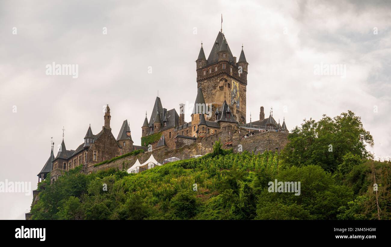 A scenic view of Cochem Castle in Cochem, Germany in cloudy sky ...