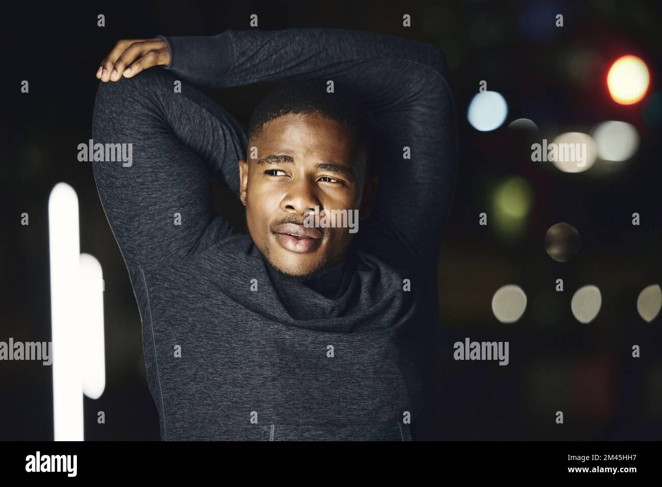 Thinking man runner stretching hi-res stock photography and images - Alamy