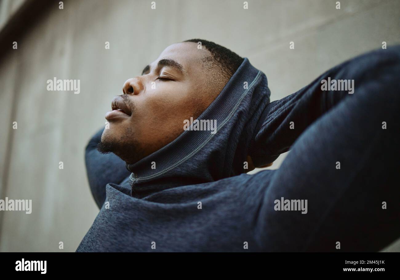 Black man, relax and tired for training, workout and outdoor exercise ...