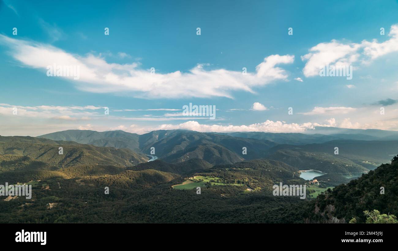 Clouds on azure blue of bright sky over the highlands. Beautiful sunset ...