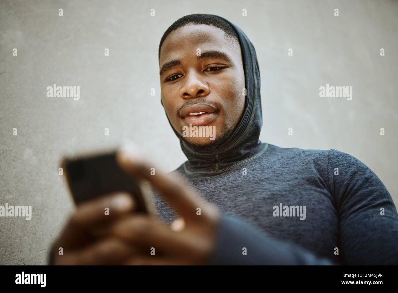 Fitness, black man and phone typing in city to check social media ...