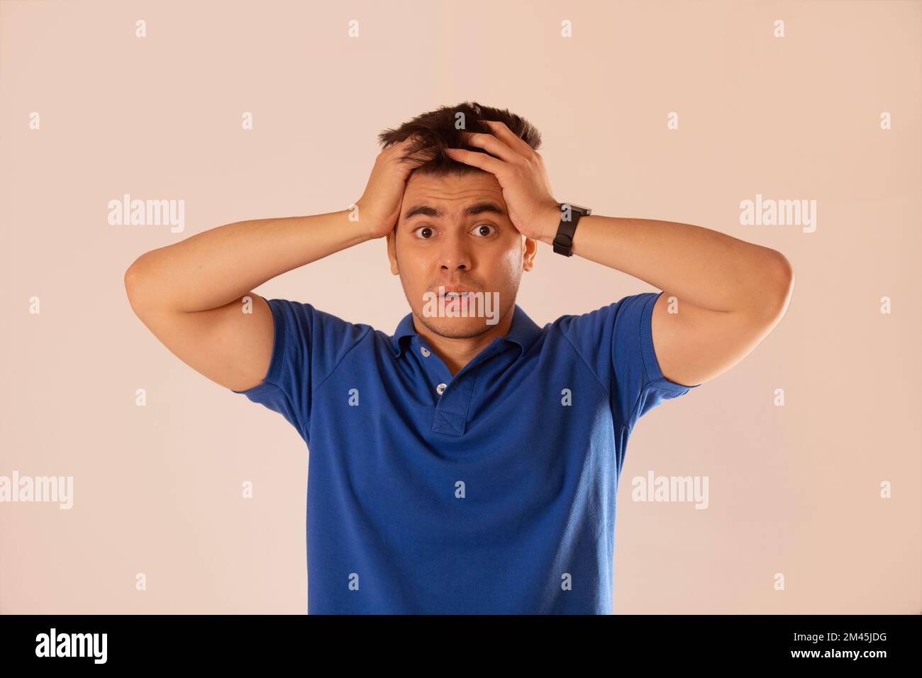 Man holding head hi-res stock photography and images - Alamy