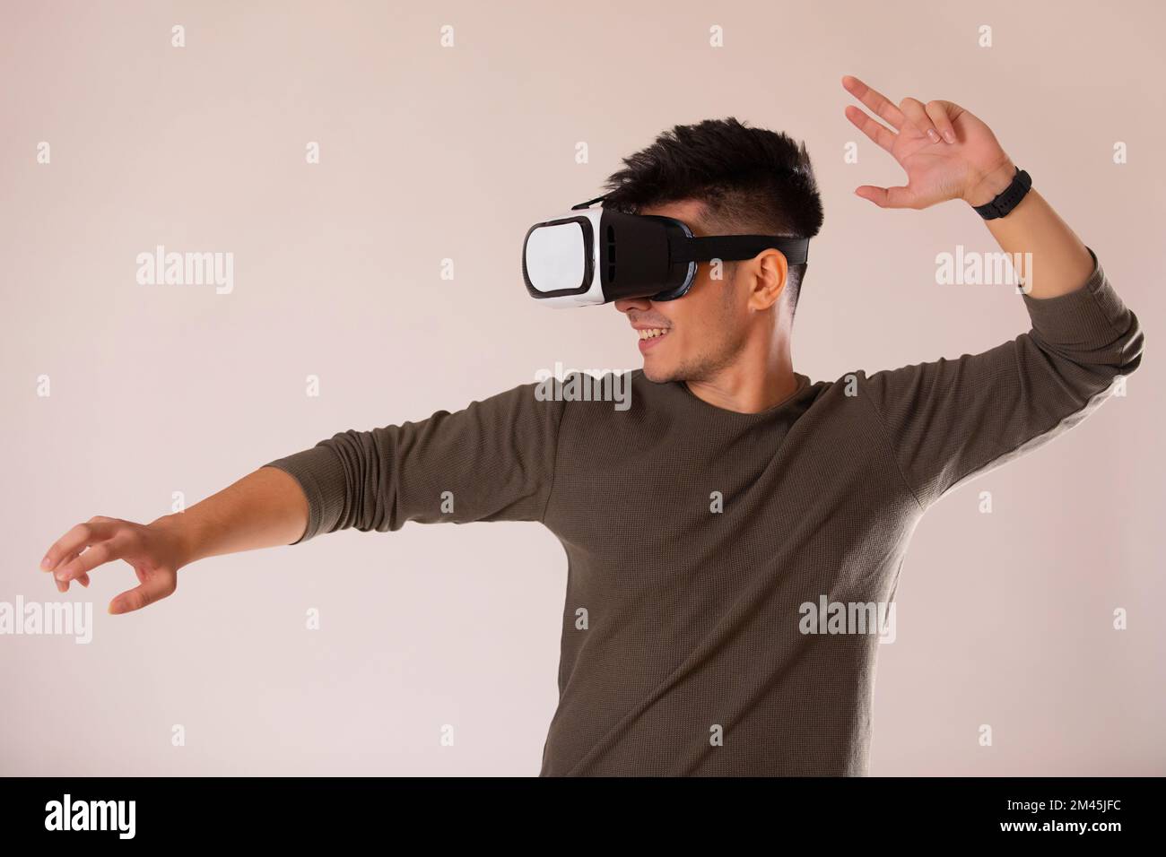 Young man experiencing side hi-res stock photography and images - Alamy