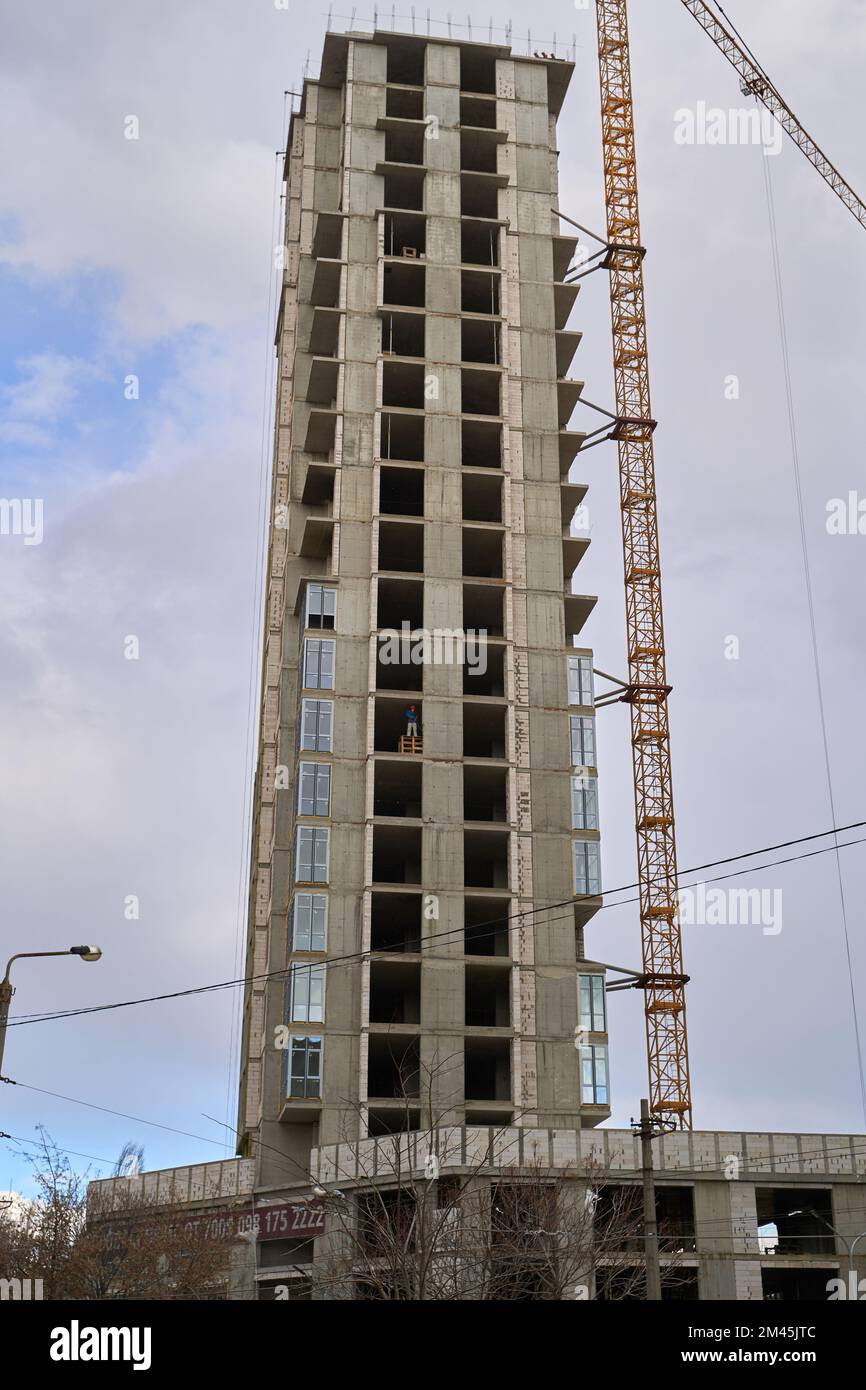 Construction site. High rise Building under construction. Construction ...