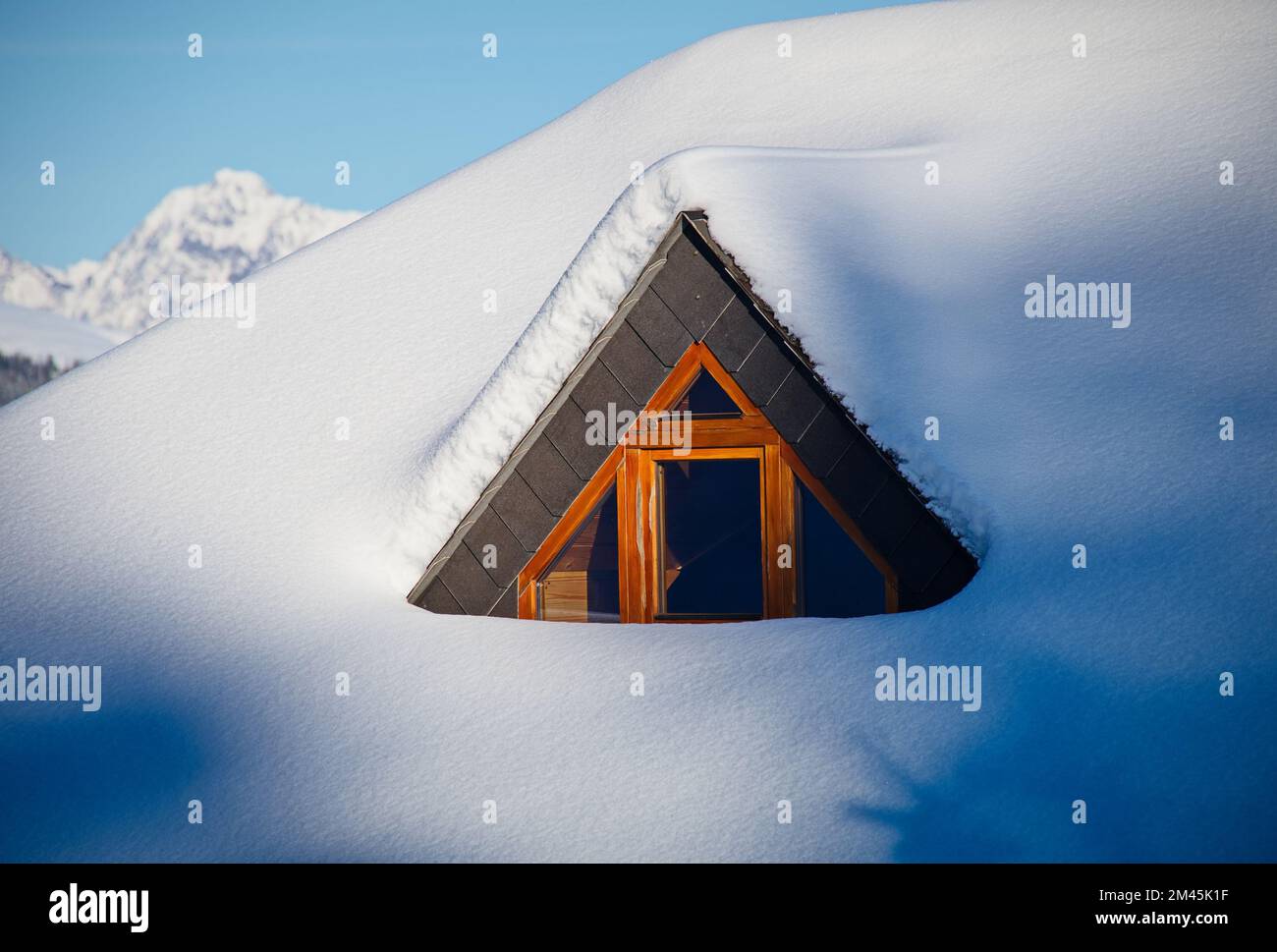 Wooden window on the roof covered with snow, Austria Stock Photo - Alamy