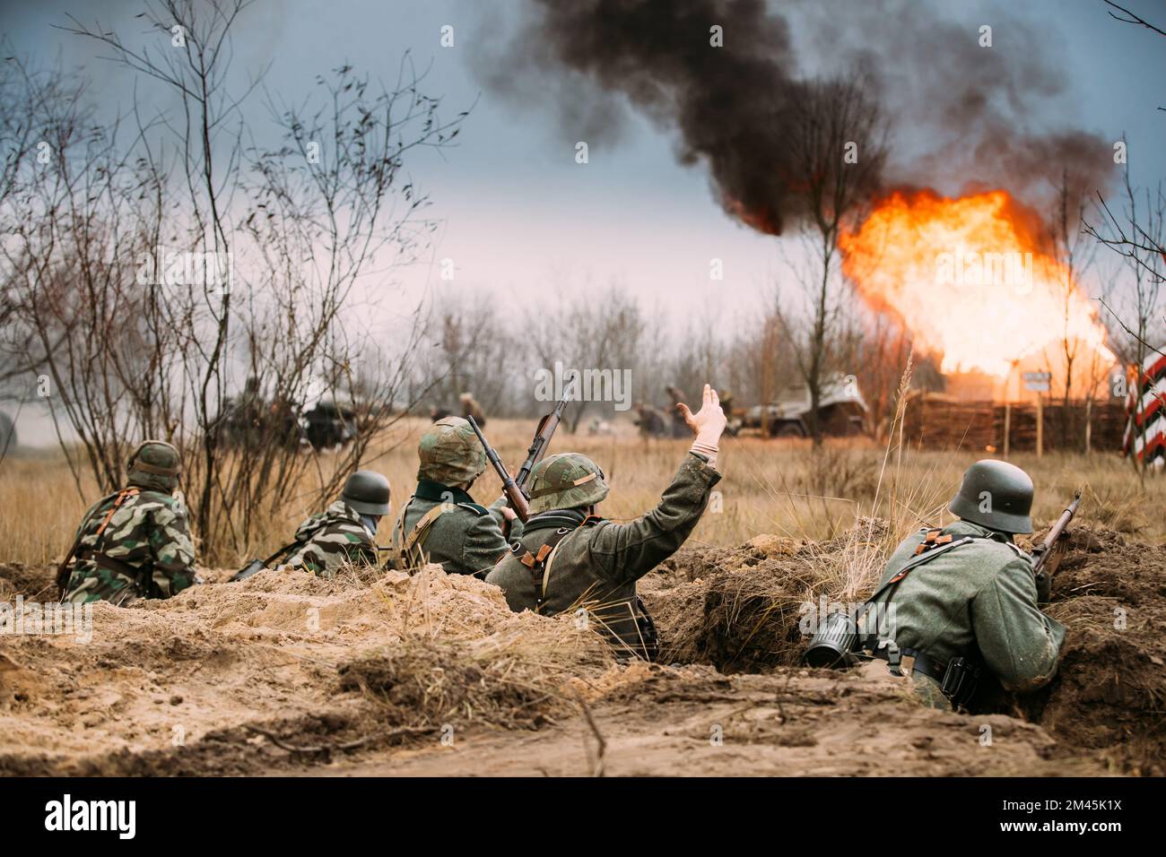 Defensive Position. Re-enactors Armed Rifles And Dressed As World War ...