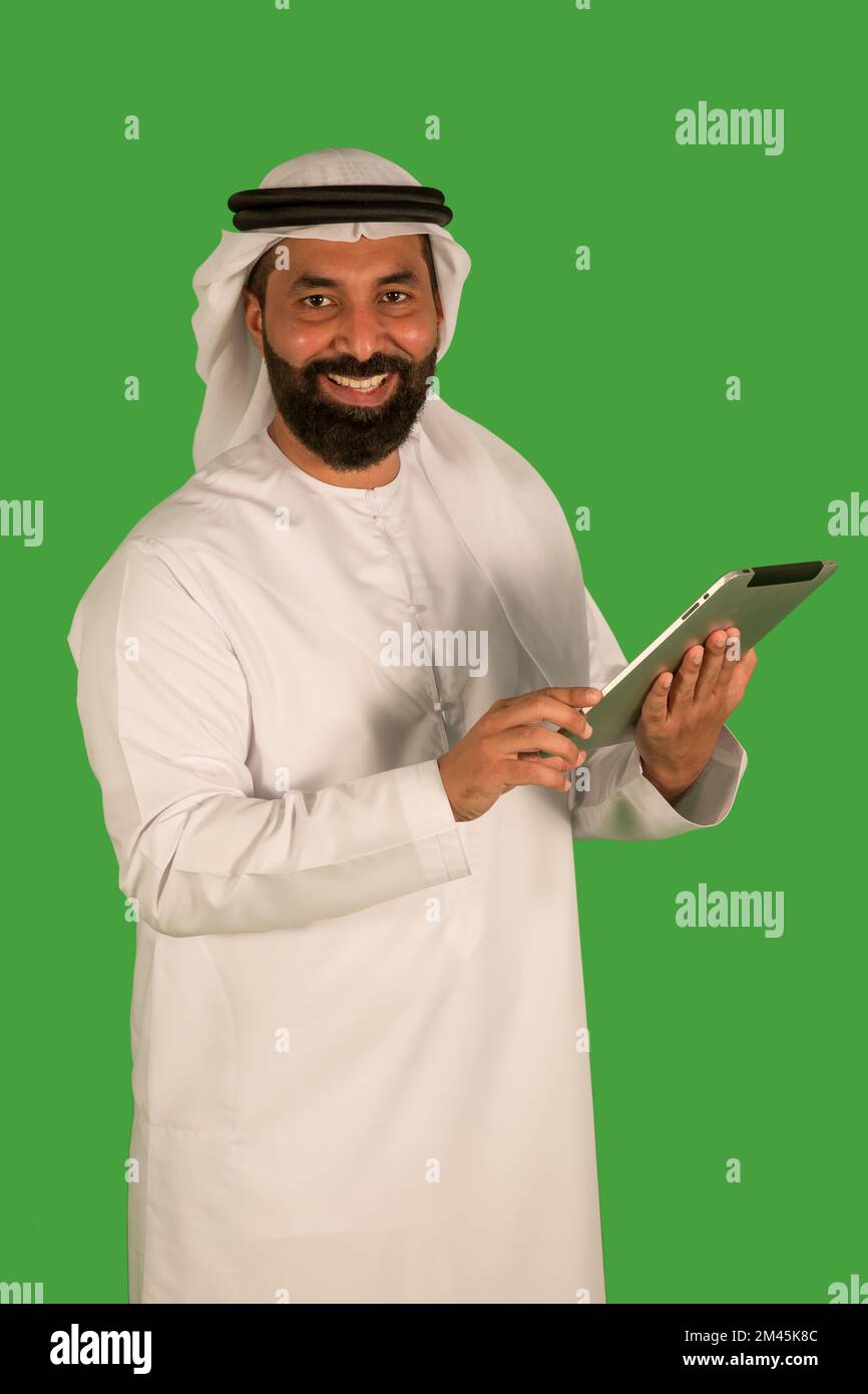 Man using tablet green chroma hi-res stock photography and images - Alamy