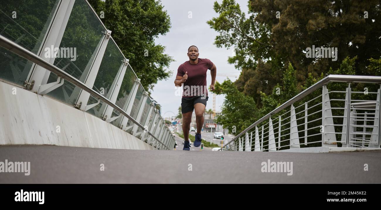 Health, black man and running for fitness, workout and training for ...