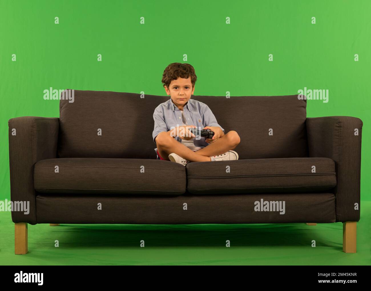 Boy playing video games Stock Photo - Alamy