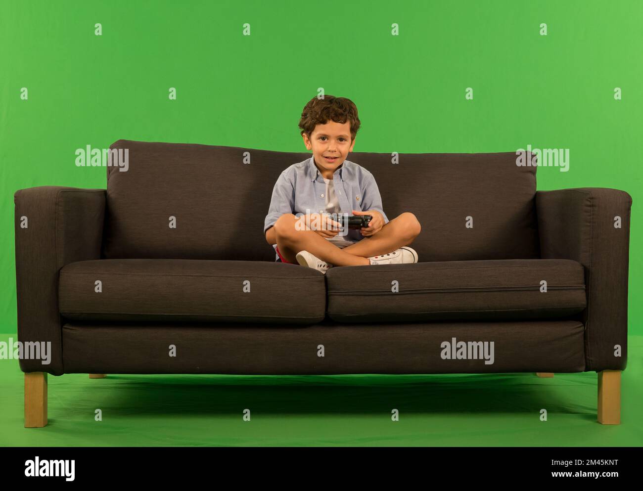 Boy playing video games Stock Photo - Alamy