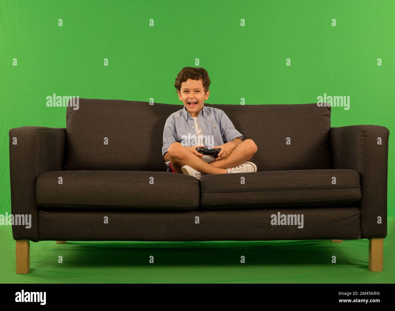 Boy playing video games Stock Photo - Alamy