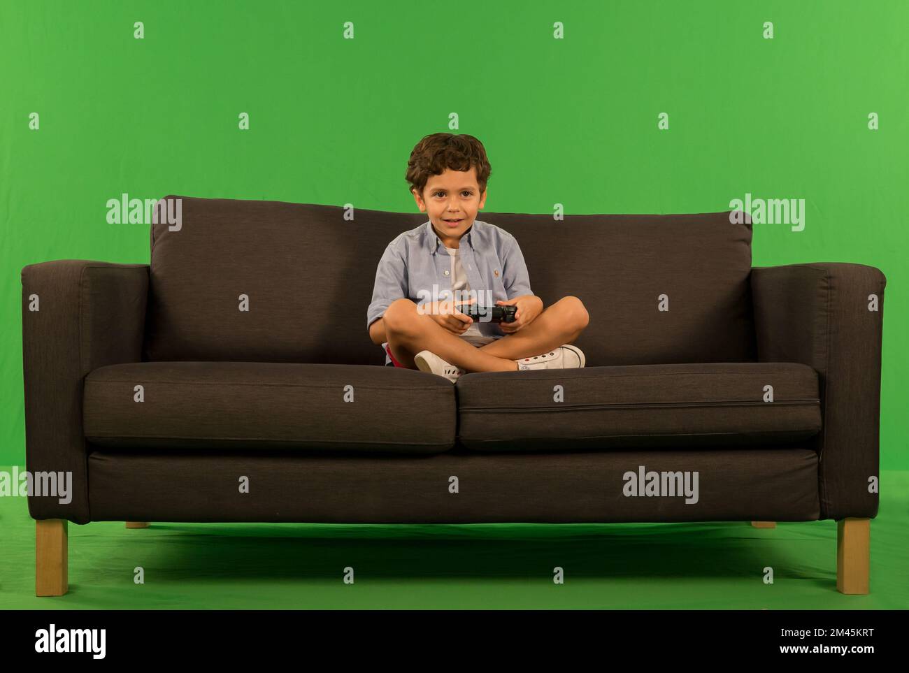 Boy playing video games Stock Photo - Alamy