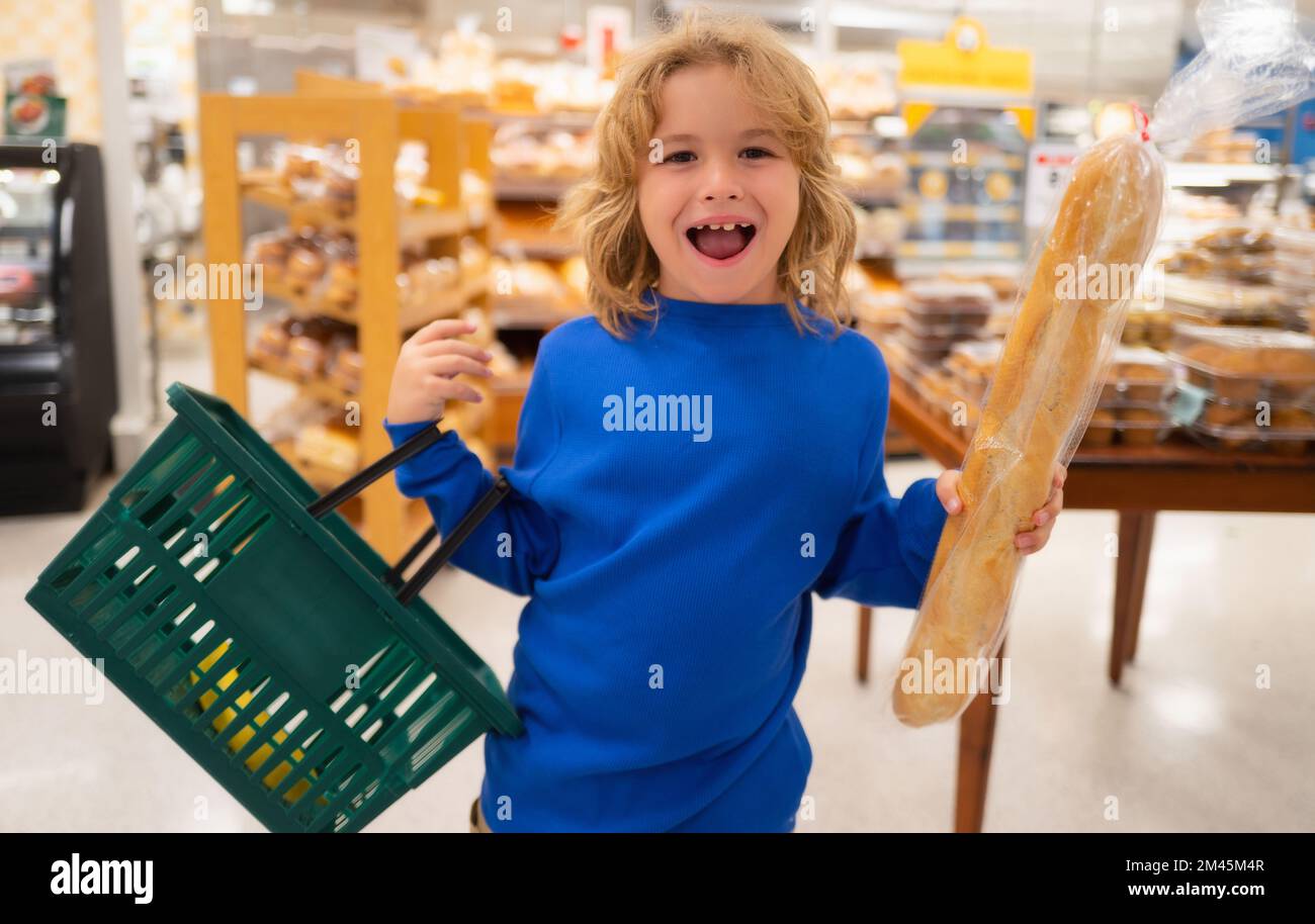 Kid choosing food in grocery store or a supermarket. Fruit and ...