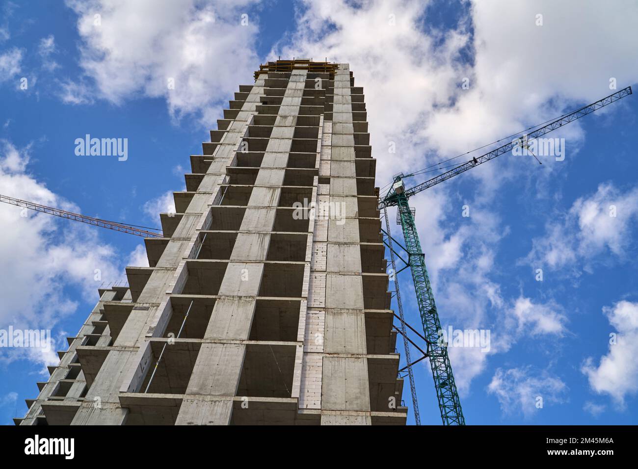 Construction site. High rise Building under construction. Construction ...