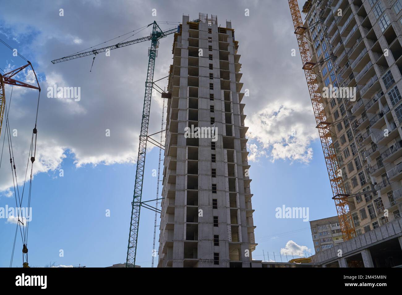 Construction site. High rise Building under construction. Construction ...