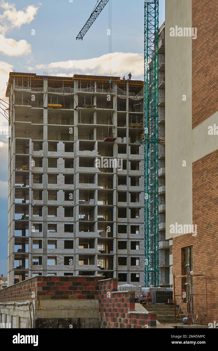 Construction site. High rise Building under construction. Construction ...
