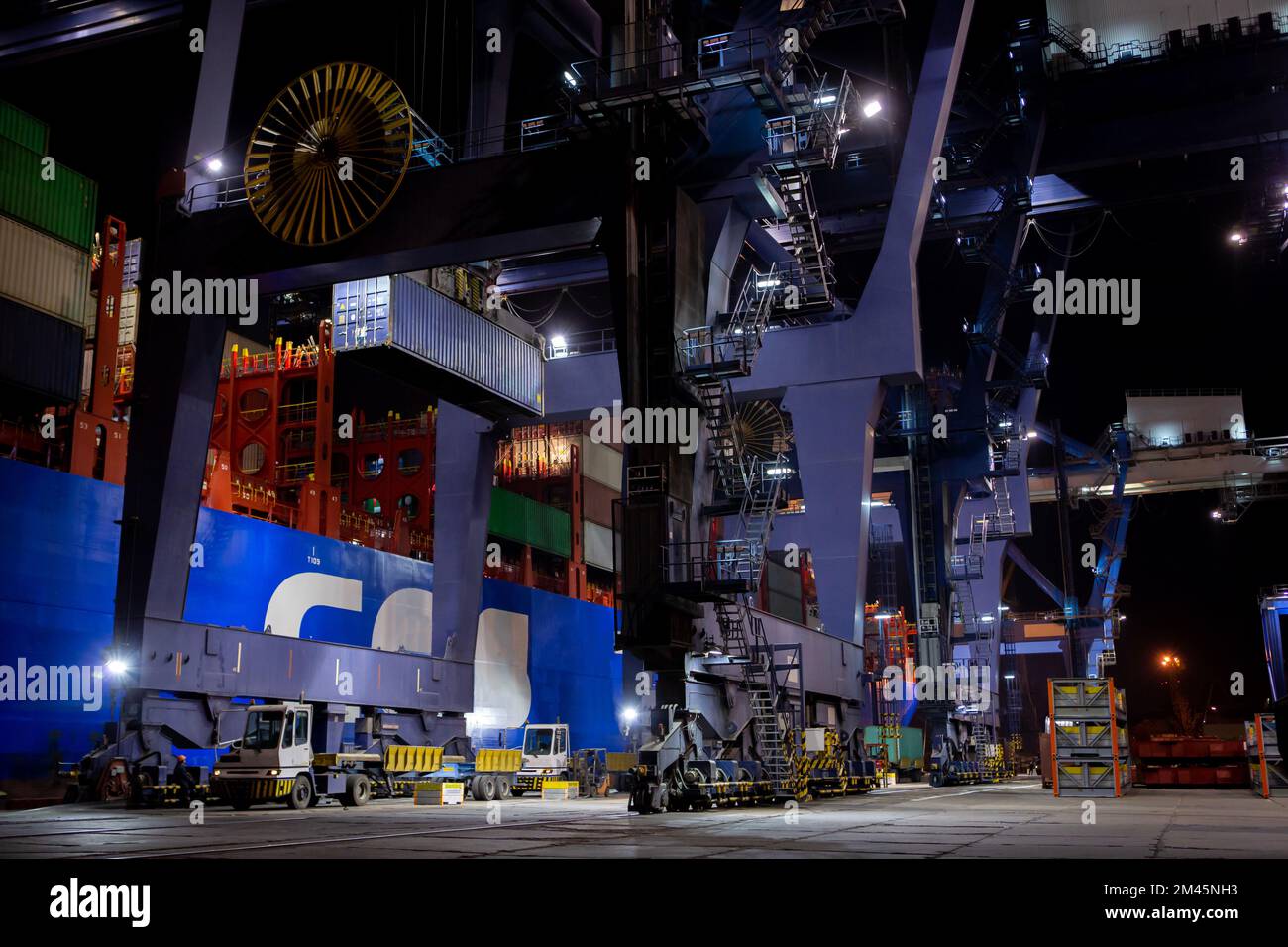 Containers loading by crane in the night , Trade Port. container ...