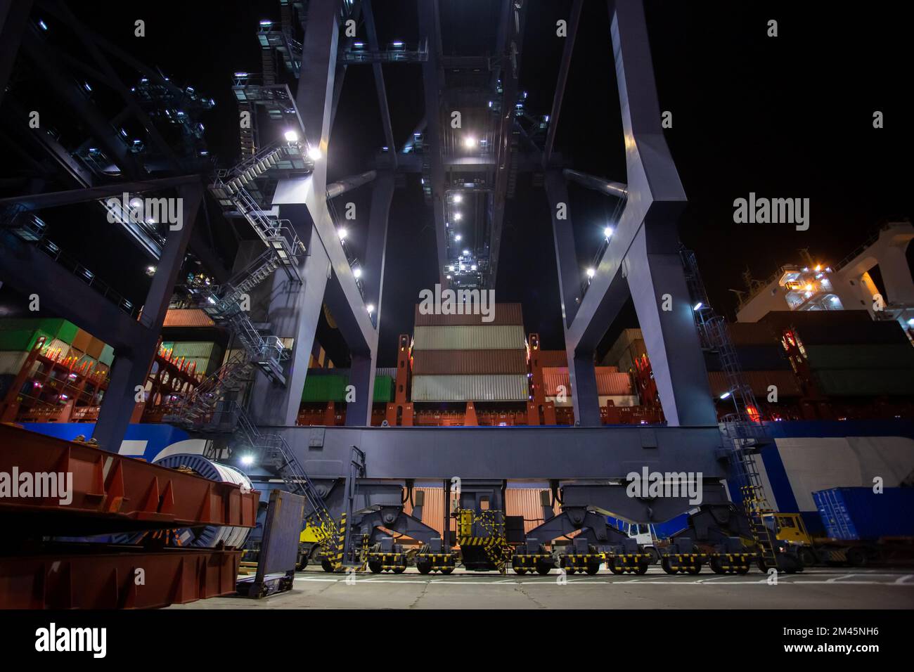 Containers loading by crane in the night , Trade Port. container ...