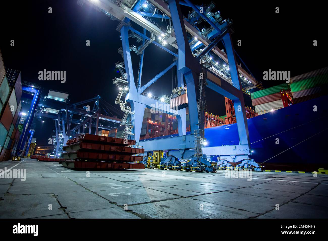 Containers loading by crane in the night , Trade Port. container ...