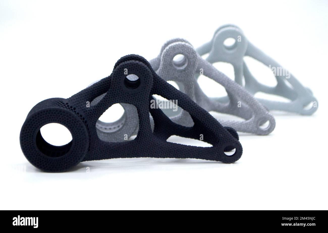 Gray models printed on 3D printer from polyamide plastic powder ... Gray models printed on 3D printer from polyamide plastic powder ...