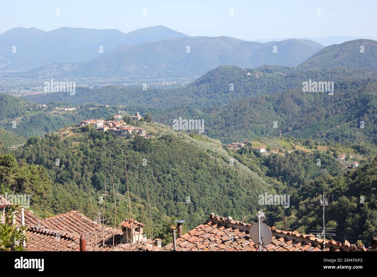 Landscape of Italian village, old traditional stone houses, hills and ...