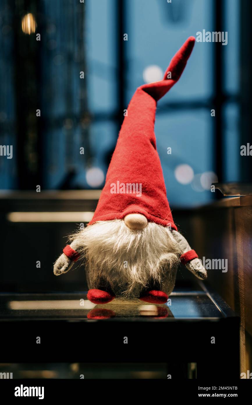 Red christmas elf in hat. Cute dwarf. santa Stock Photo - Alamy