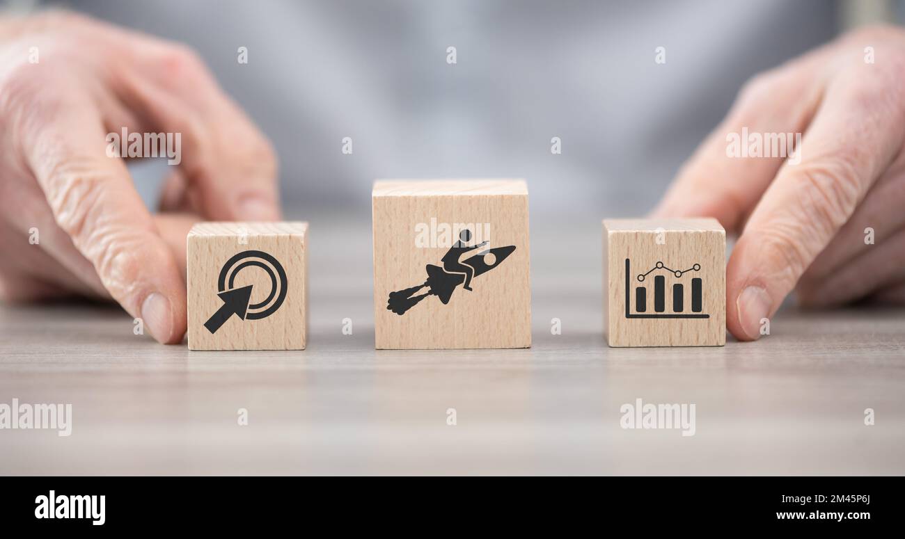 Wooden blocks with symbol of success concept Stock Photo - Alamy