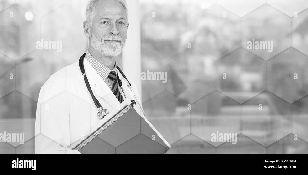 Portrait of senior doctor standing and holding a folder, geometric ...
