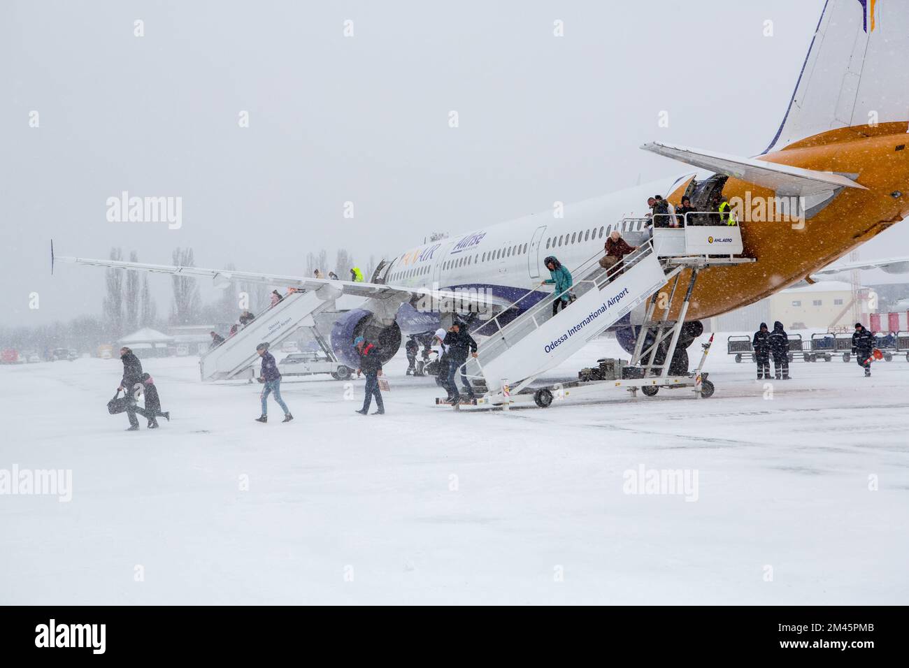 Odessa, Ukraine - CIRCA 2018: Passenger plane at airport in winter in ...