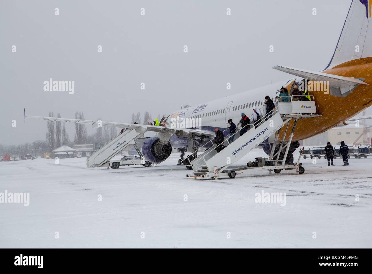 Odessa, Ukraine - CIRCA 2018: Passenger plane at airport in winter in ...