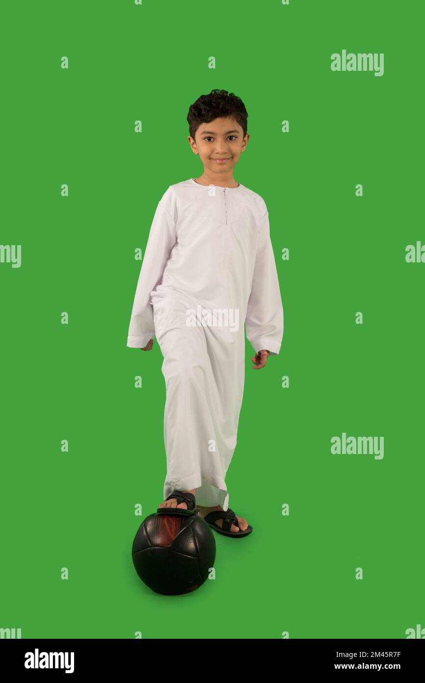 Arab boy with a football Stock Photo - Alamy