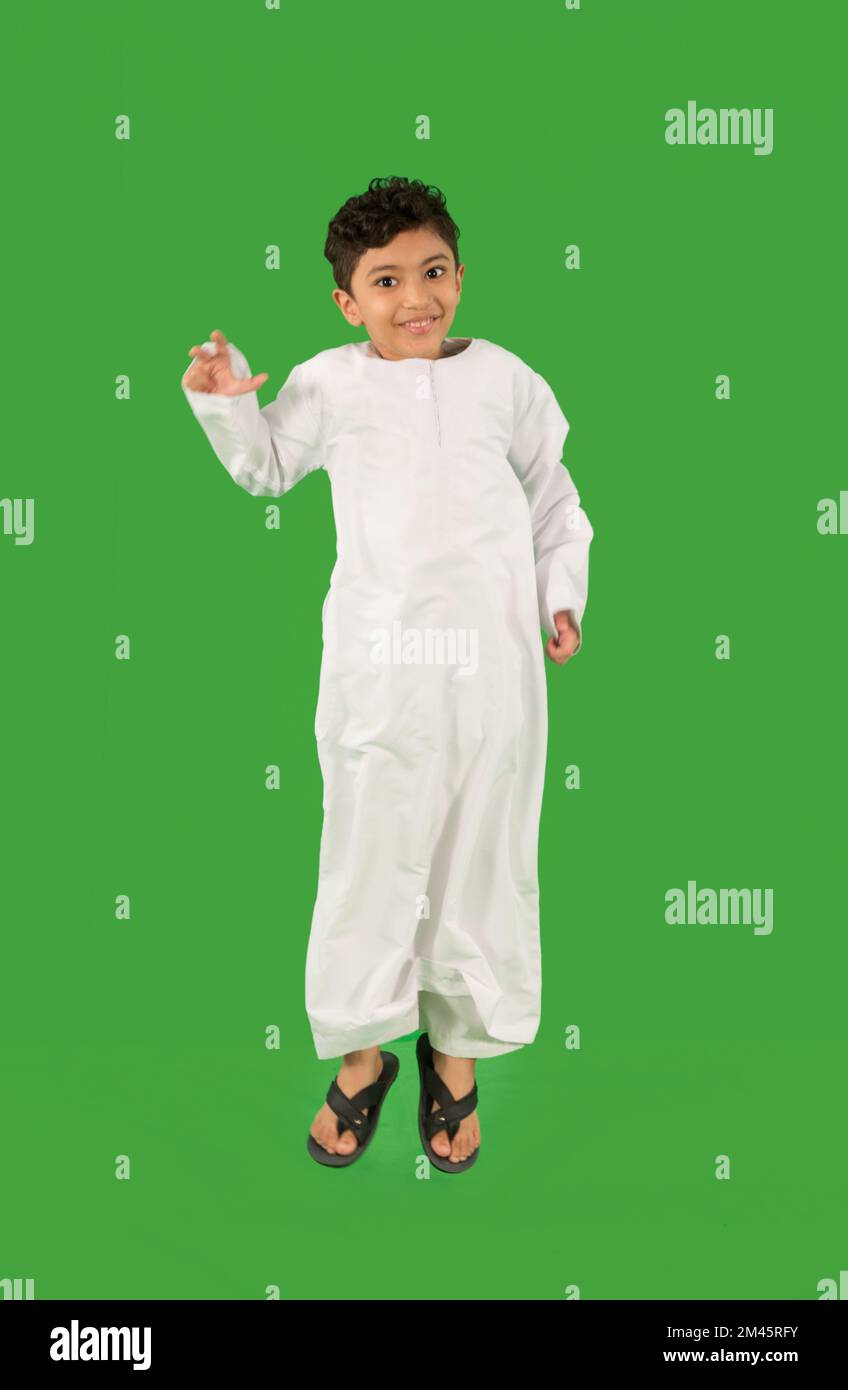 Arab boy jumping Stock Photo - Alamy