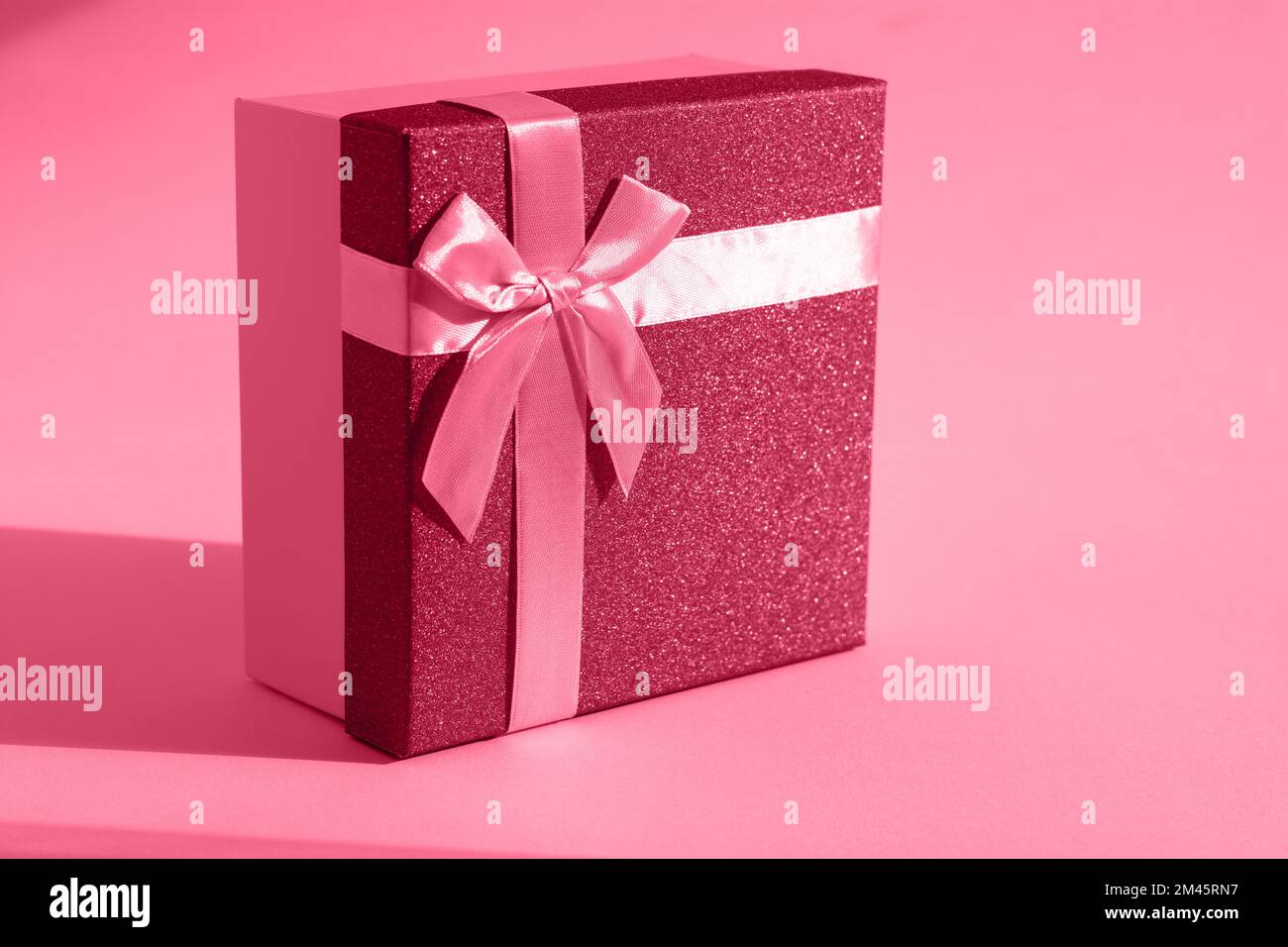 Viva magenta gift. The fashionable trending color of 2023. Tinted image ...