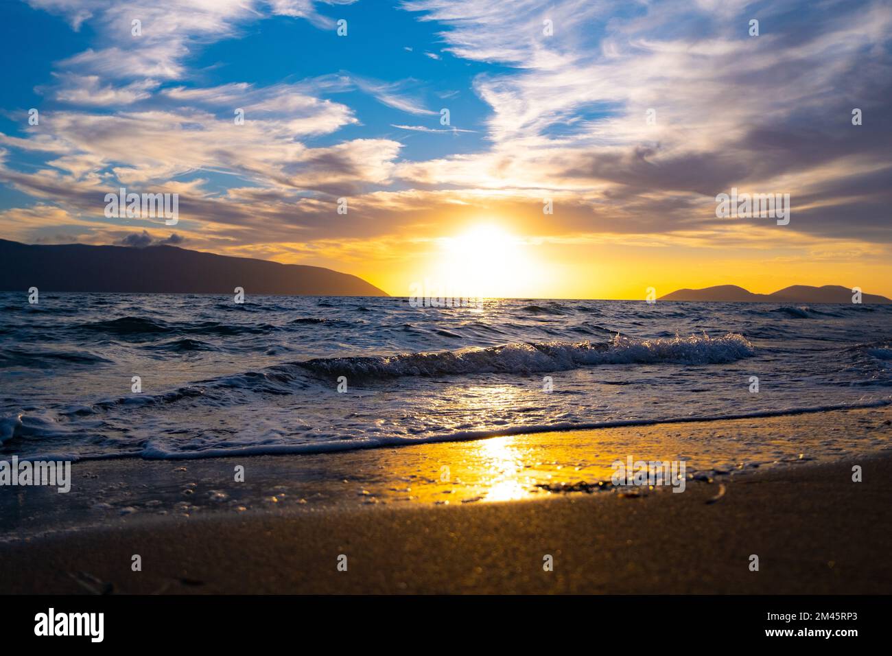 Sunset on the Adriatic Sea in the city of Vlore with palm trees and ...