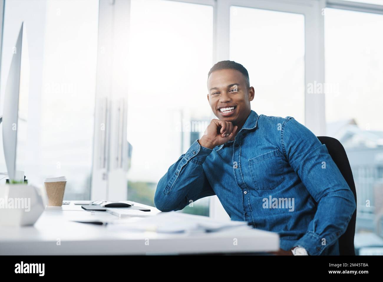 I took my own path to success. Portrait of a young businessman posing ...
