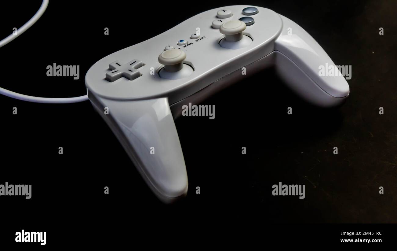 white joystick isolated on black background Stock Photo - Alamy