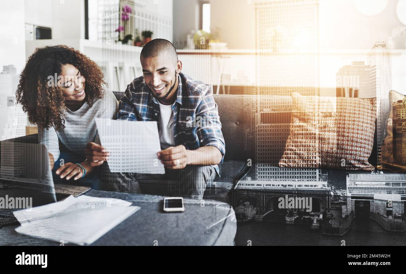 Building a tight household budget. a young couple going through their ...