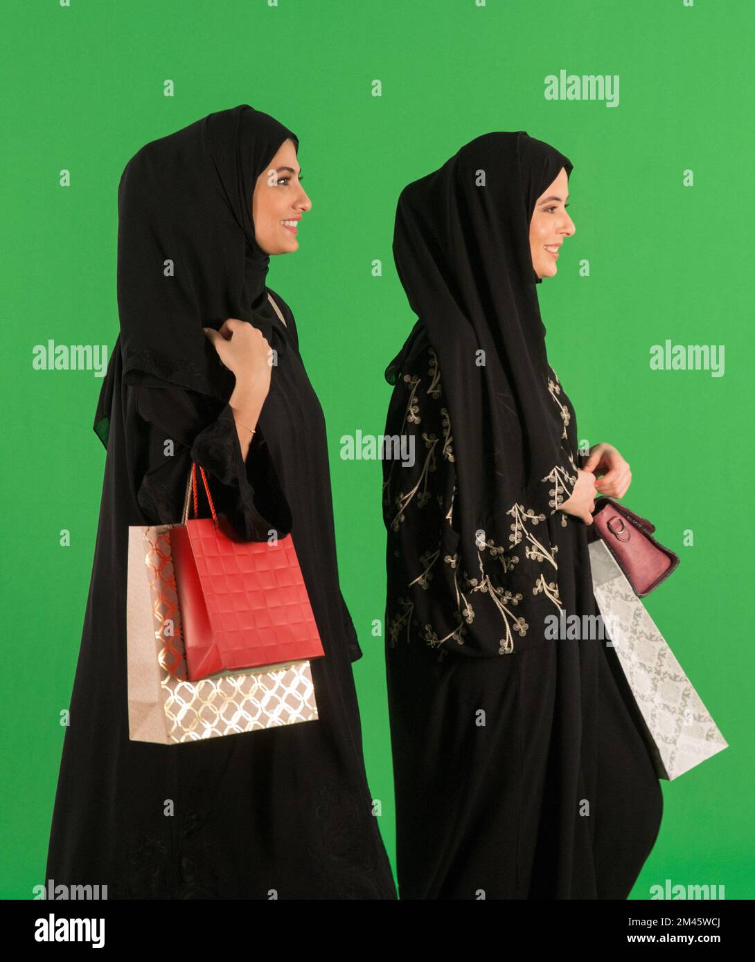 Two arab women shopping bags hi-res stock photography and images - Alamy
