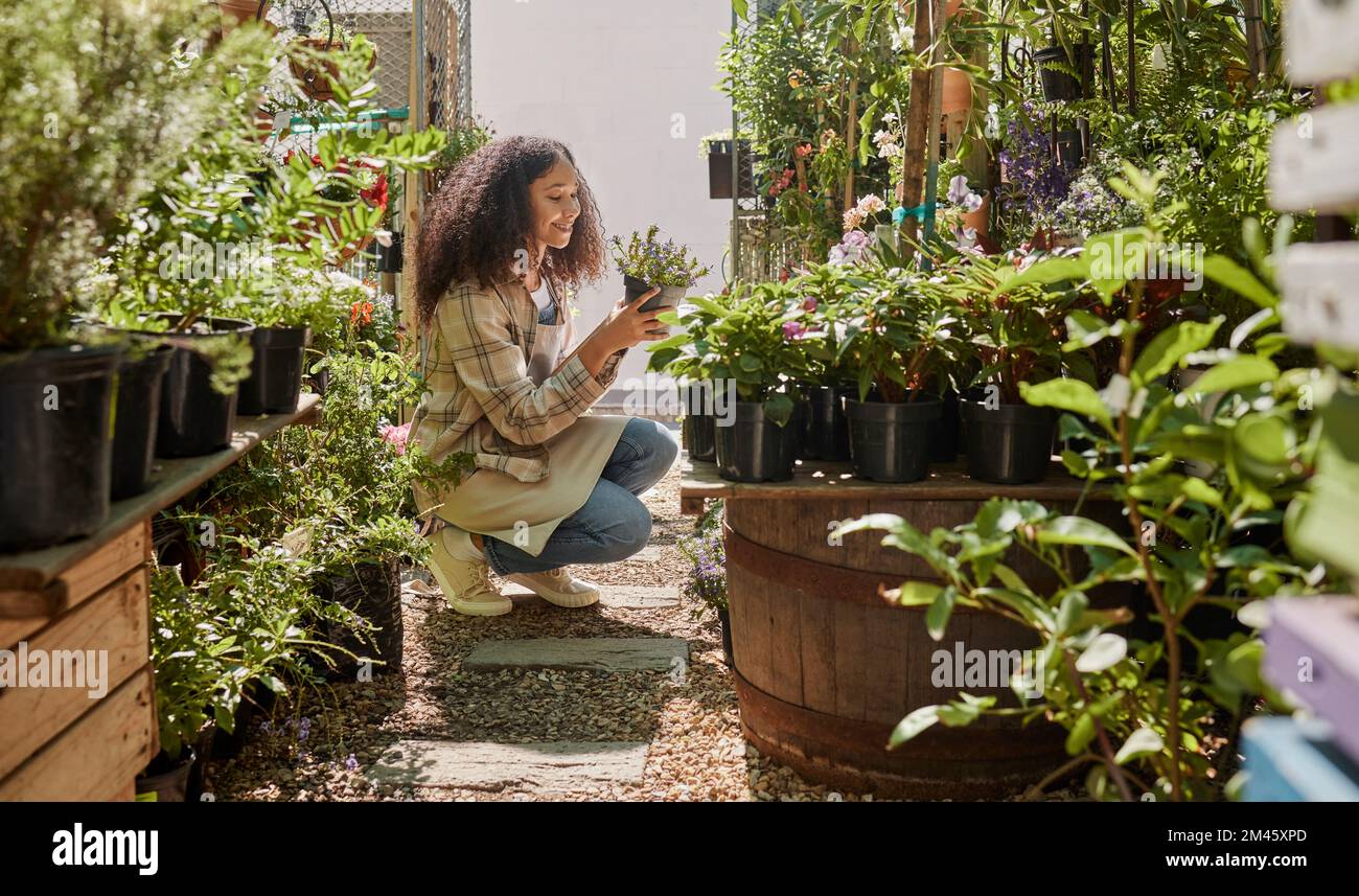 Black woman, garden and plants with nature and green, environment with ...