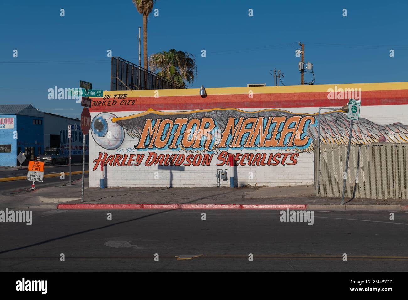 A colorful graffiti text Harley Davidson motorcycle repair shop in the ...