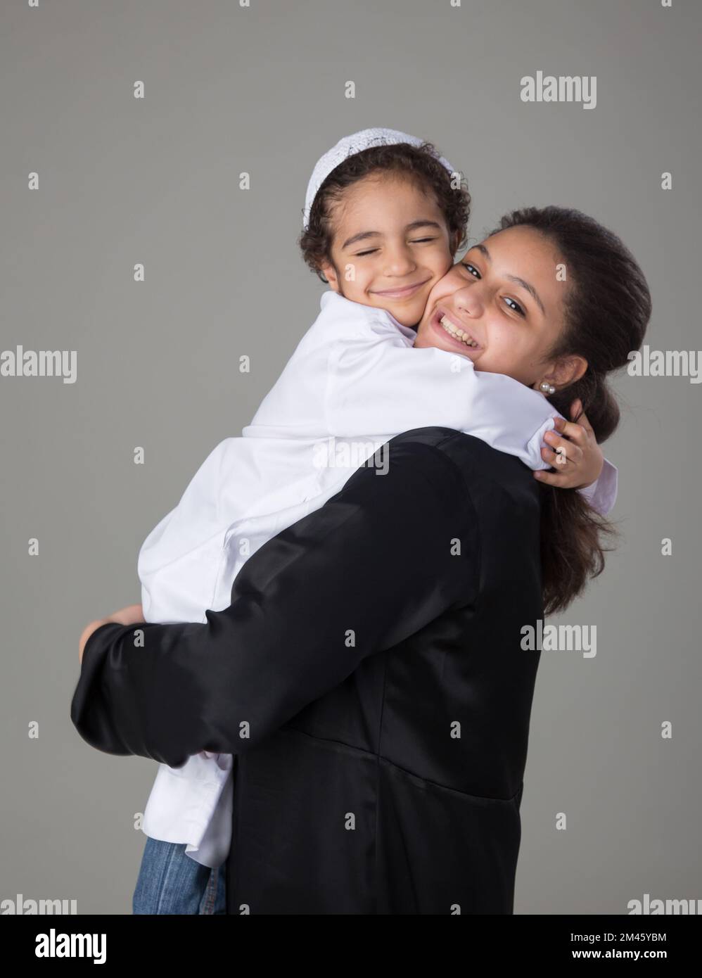 Portrait of two arab siblings Stock Photo - Alamy