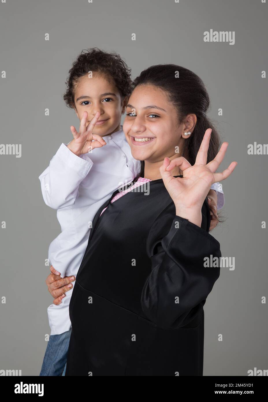 Portrait of two arab siblings Stock Photo - Alamy