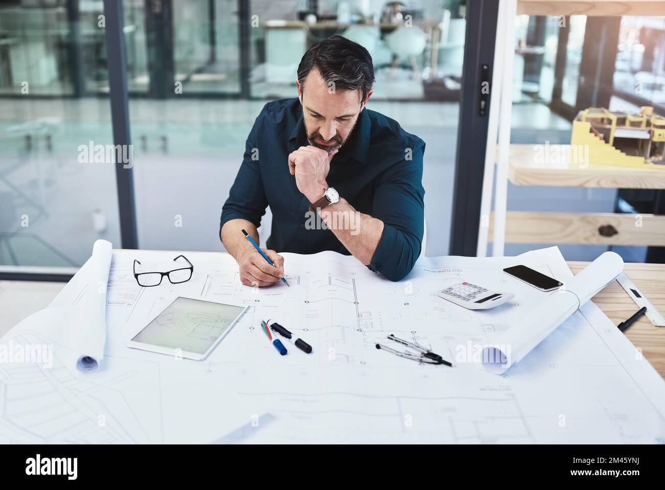 There is a lot that goes into being an architect. a mature male ...