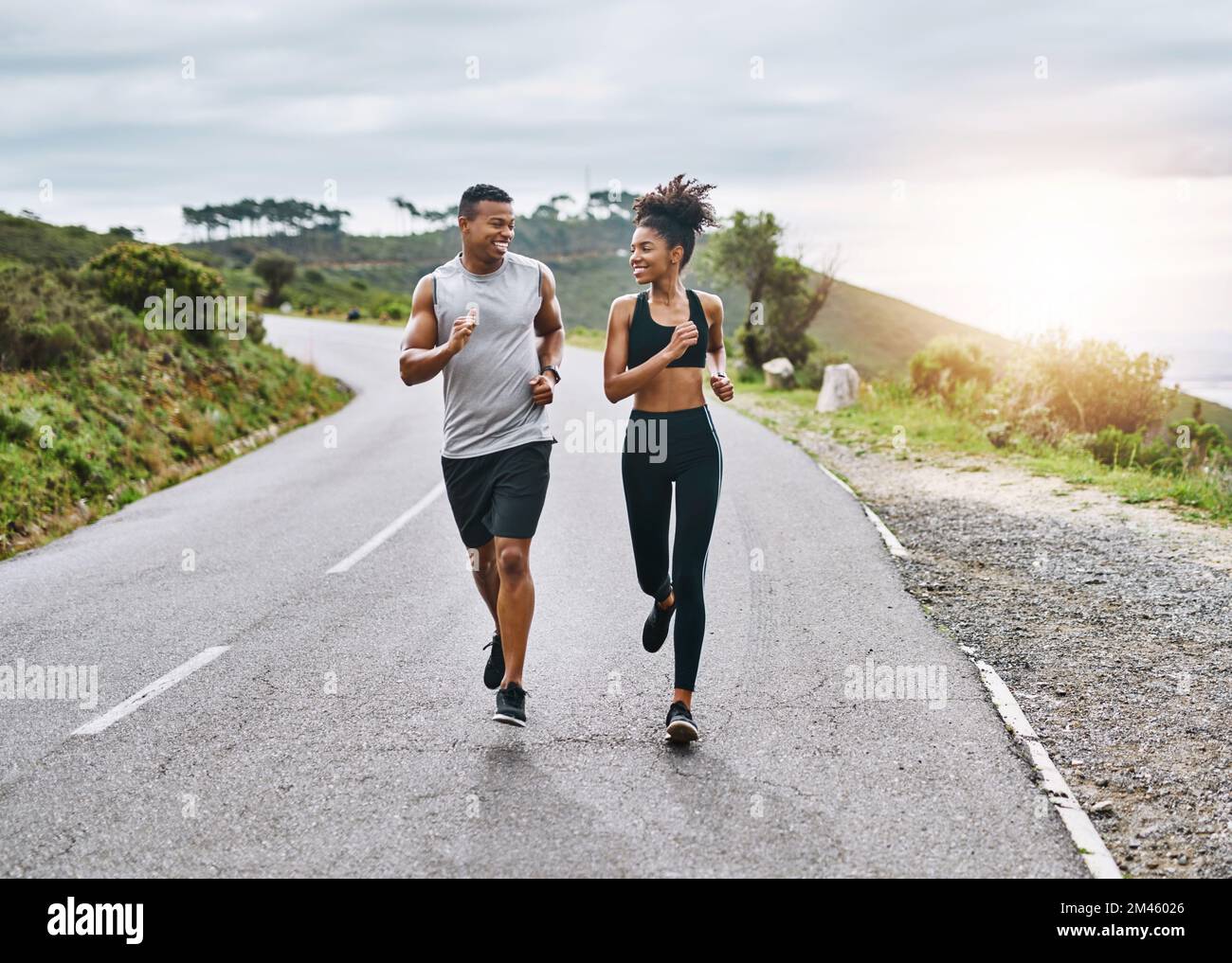 Out in the fresh air for a great workout. a sporty young couple ...