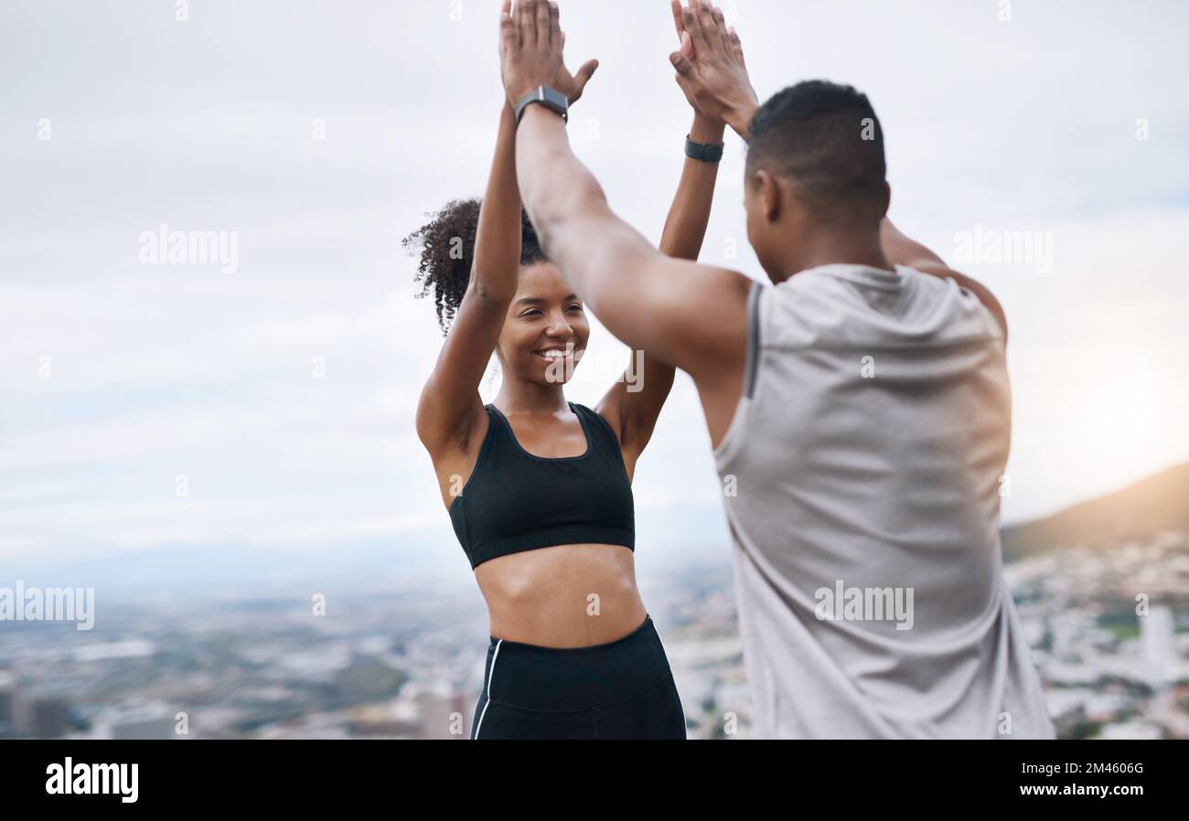 Thank you for being my best motivator. a sporty young couple high ...