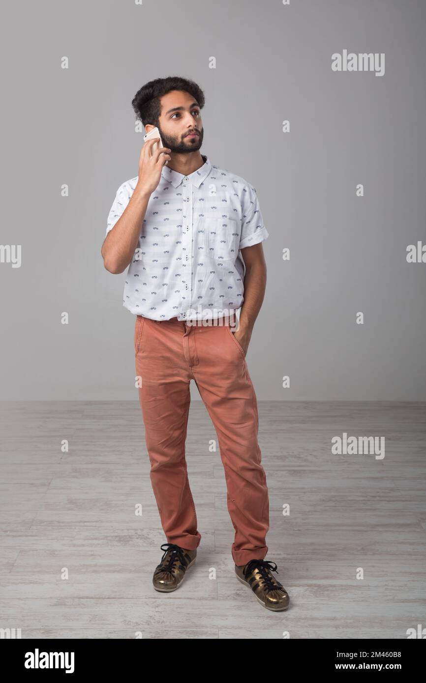 Portrait of an Expat Arab talking on the phone Stock Photo - Alamy
