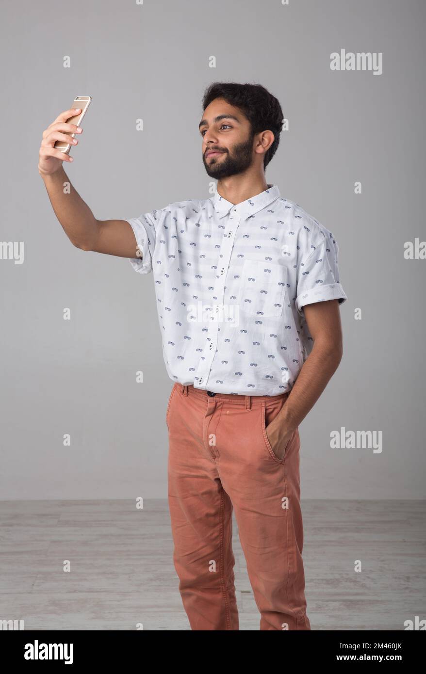 Portrait of an Expat Arab.Portrait of an Expat Arab taking a selfie ...