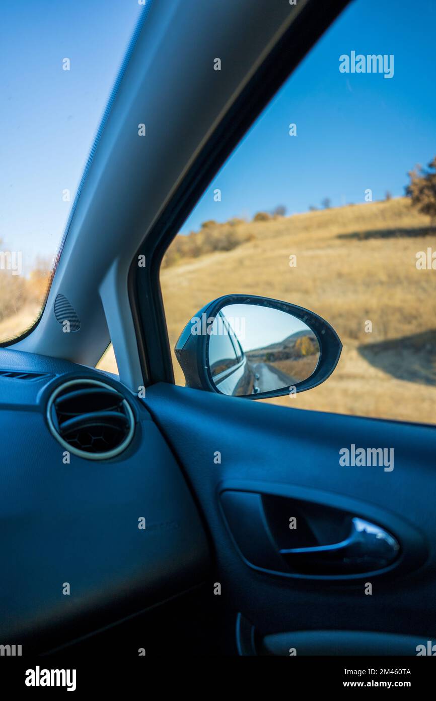 The road visible in the mirror inside the car Stock Photo - Alamy
