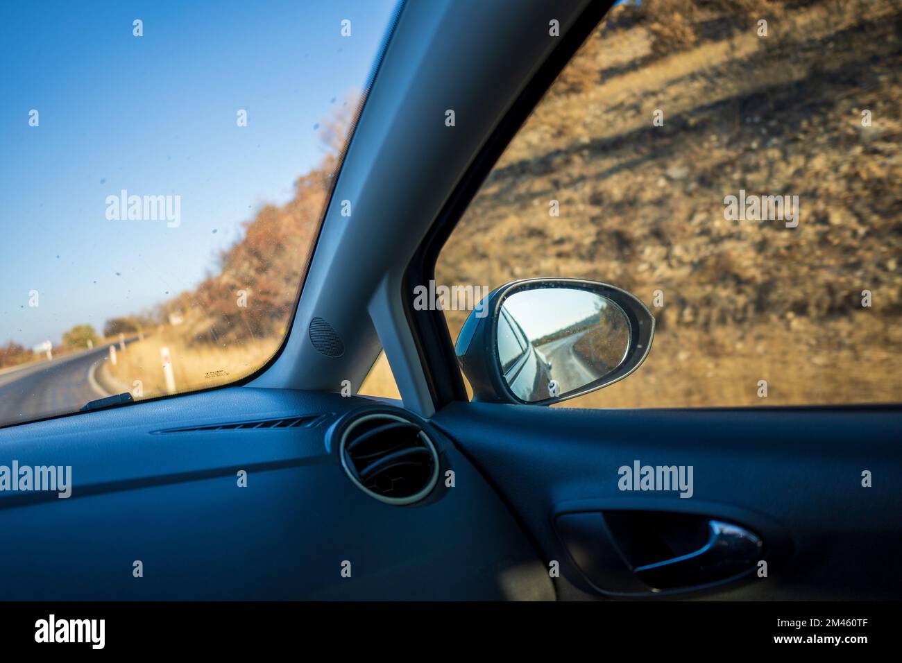 The road visible in the mirror inside the car Stock Photo - Alamy